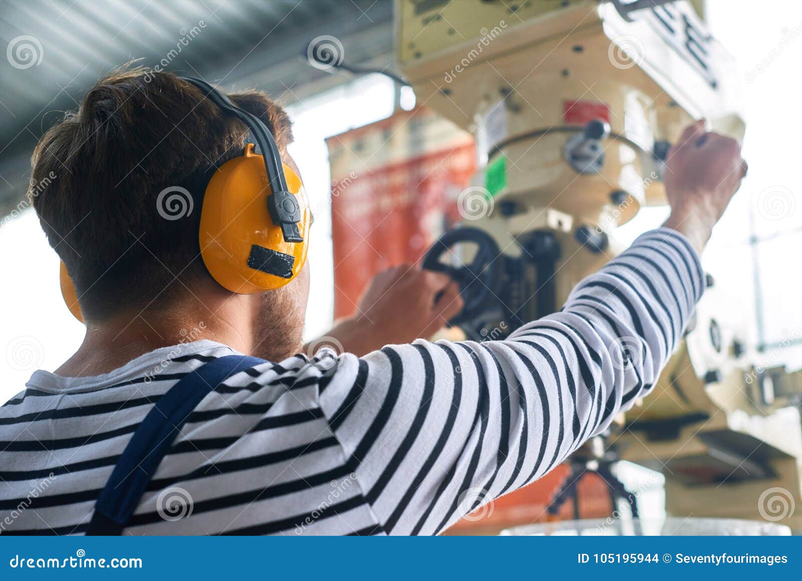 Back View of Worker Operating Machine Unit Stock Photo - Image of metal ...
