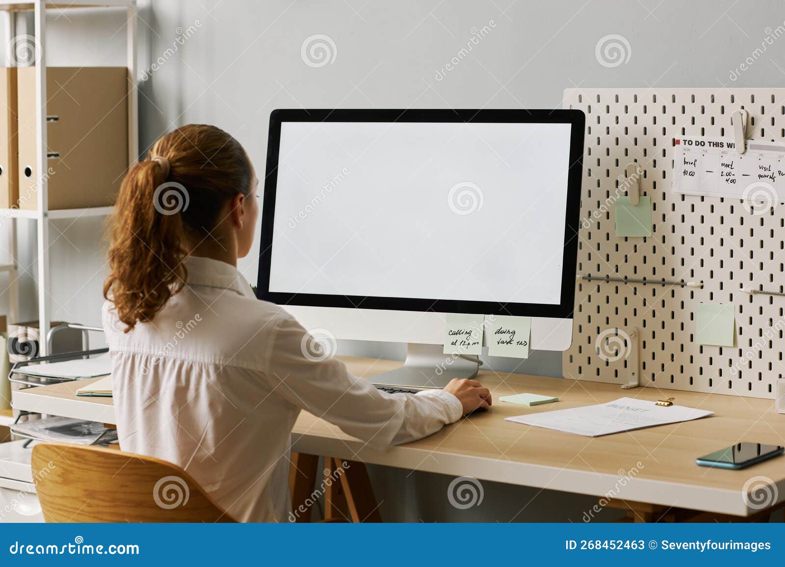 Back View Young Woman Using Computer with White Screen Mockup Working ...