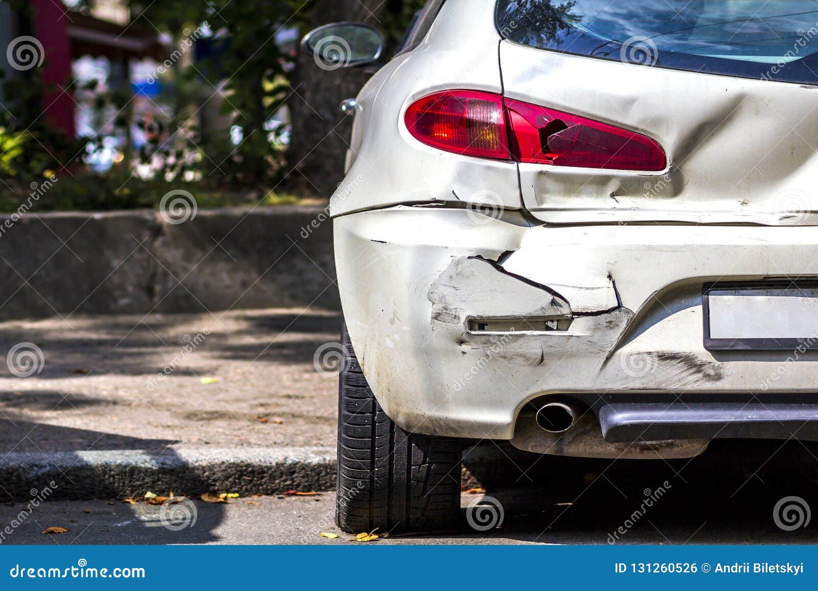 Back of White Car Damaged by Accident on the Road Stock Photo - Image ...