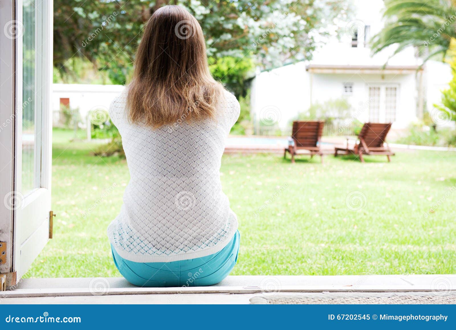 Back of Woman Sitting and Looking Outside Stock Image - Image of ...