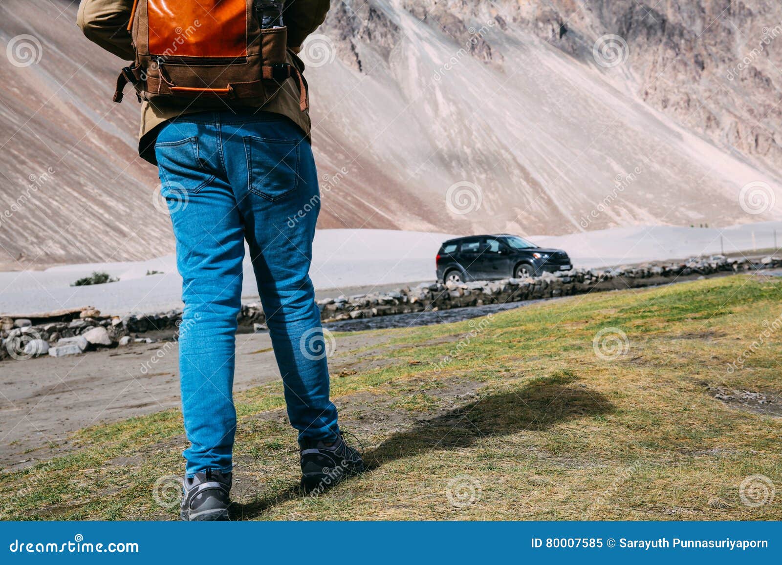 Back of Young Travel Backpacker Walking Towards the Highland Mountain ...