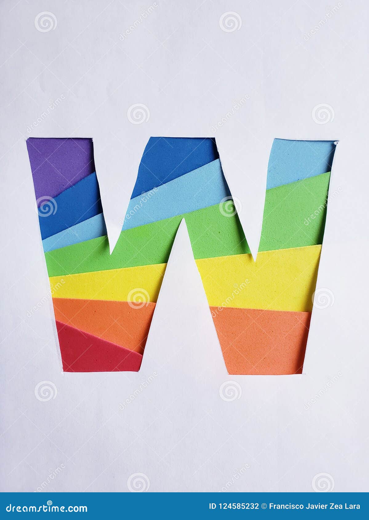 Letter W with Cuts of Foamy in Rainbow Colors and White Background ...