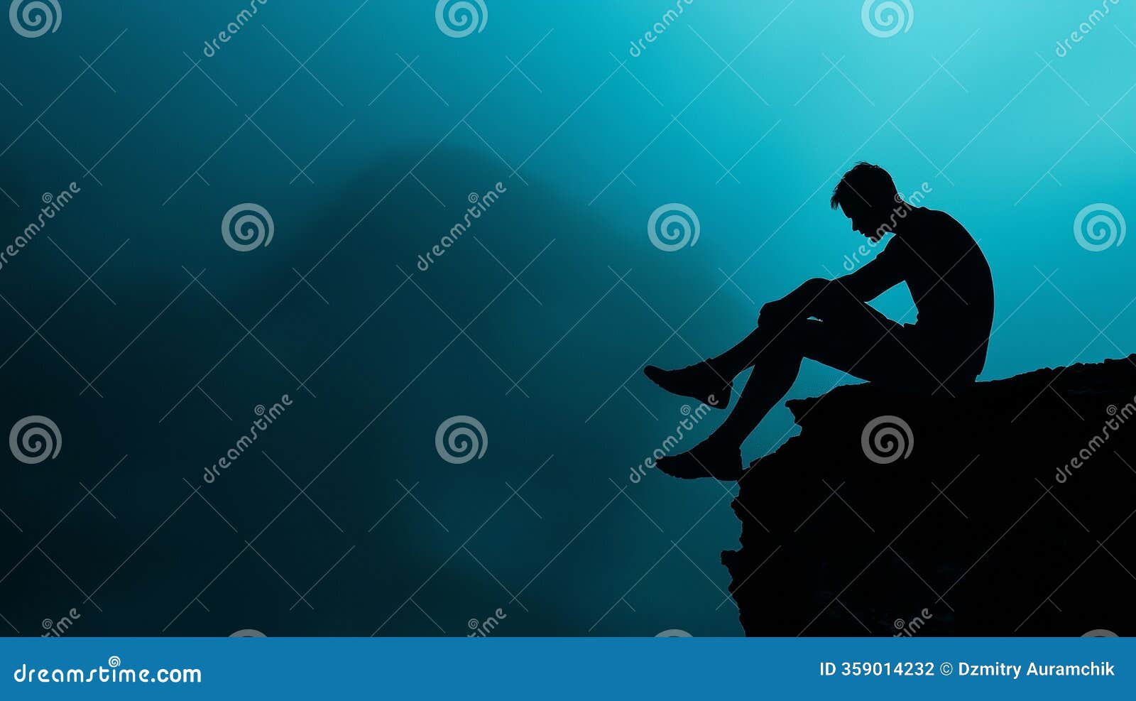 With a Backdrop of Dramatic Clouds, a Lone Man Sits on a Mountain Peak ...