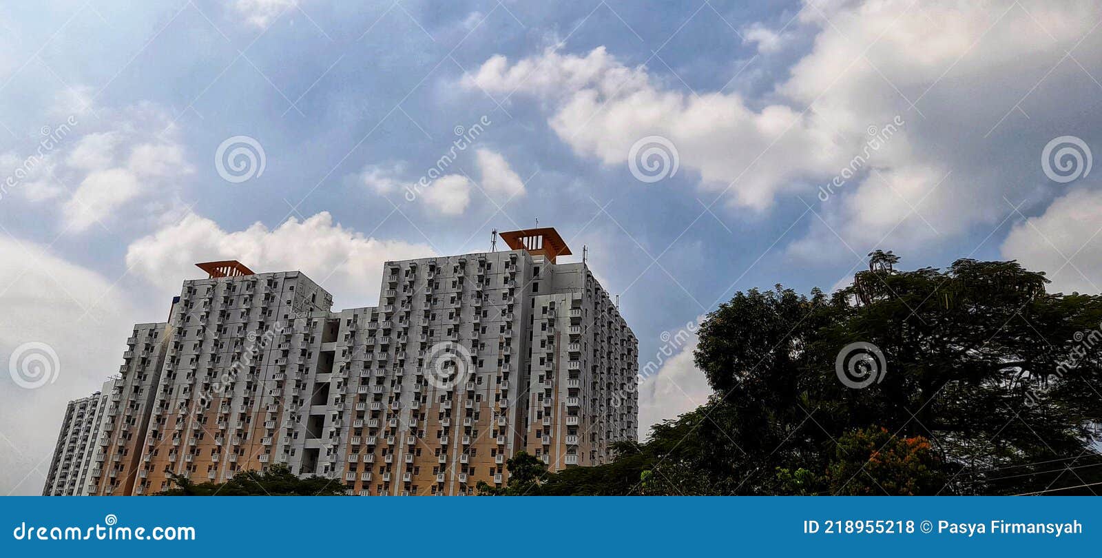 The Backdrop of the View of the Towering Apartment Building with the ...
