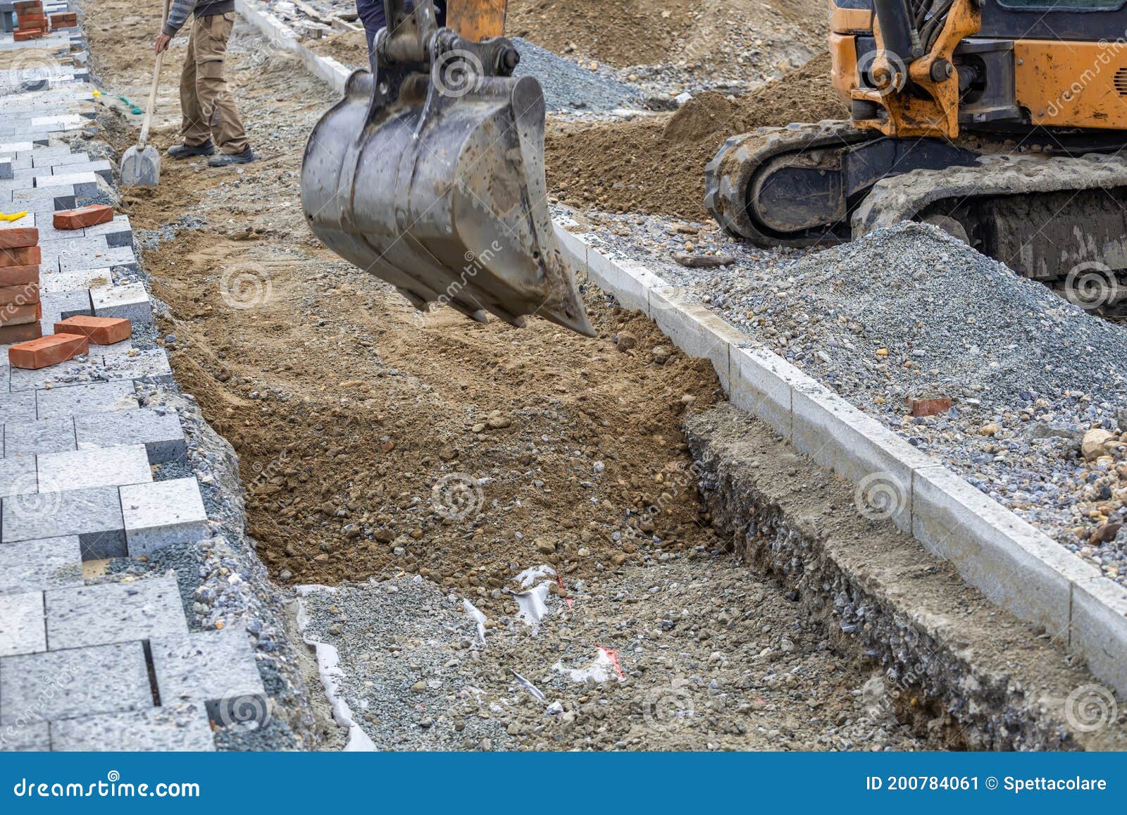 Backfill and Power Cables Installation during a Sidewalks or Patio Reconstruction Project Stock ...