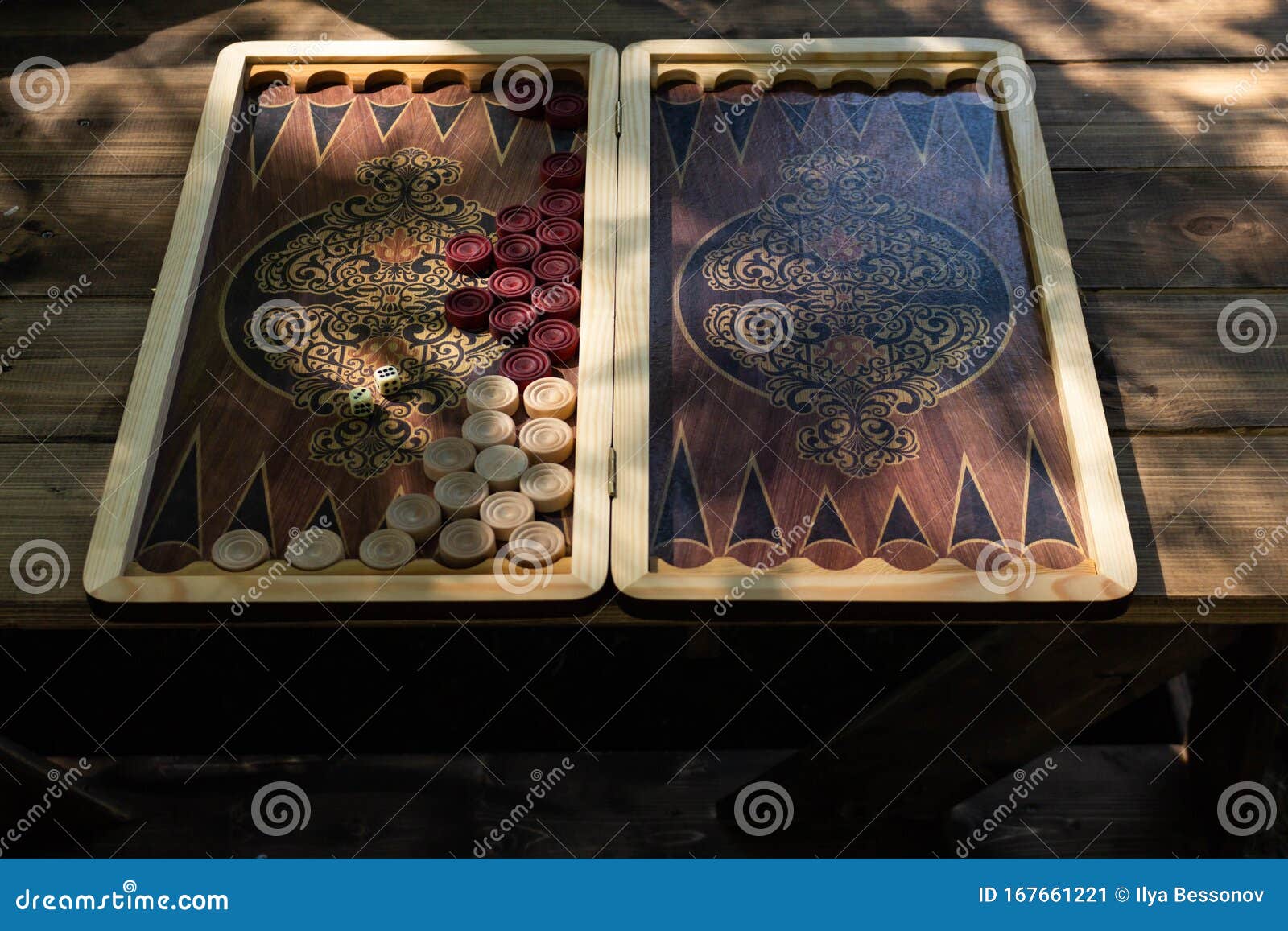 Backgammon Board Game for Two Players on a Special Board. Sun Rays ...