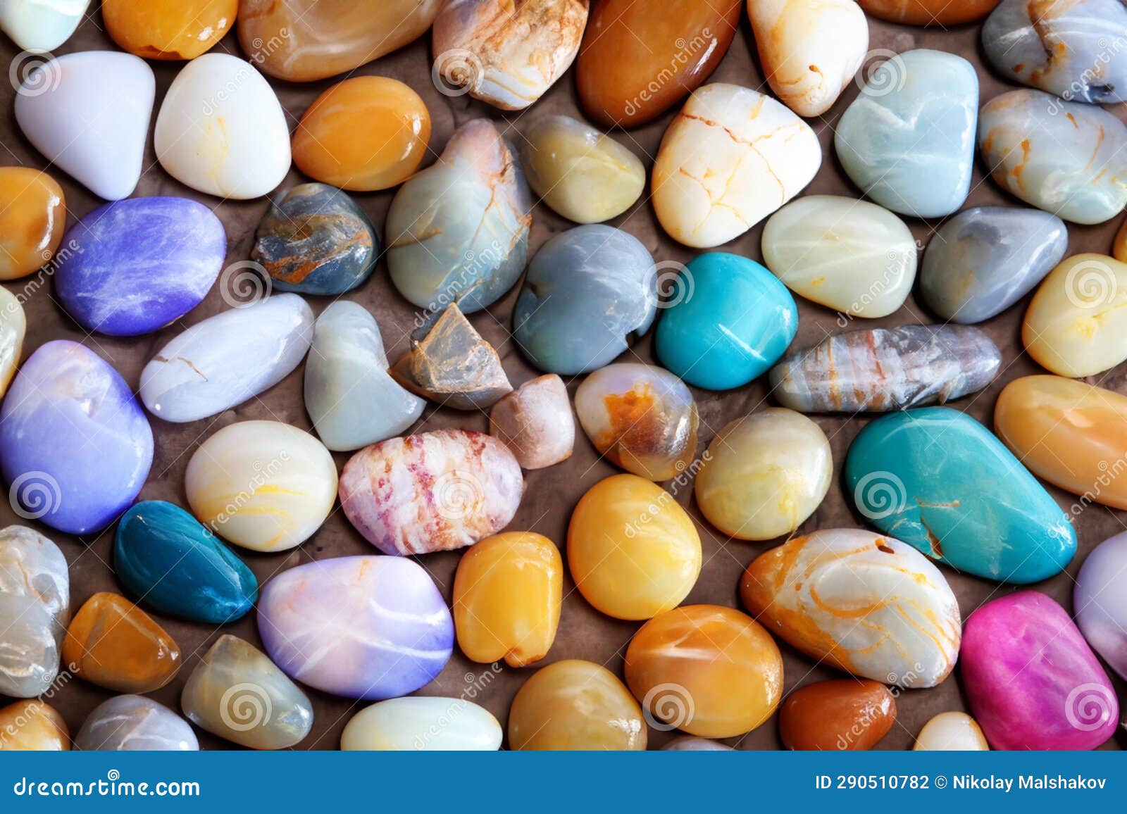 A Background Adorned with an Assortment of Bright-colored Stones. Stock ...