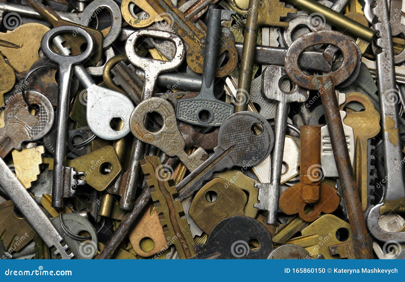 Background of Assorted Old Multi-colored Metal Antique Keys of ...