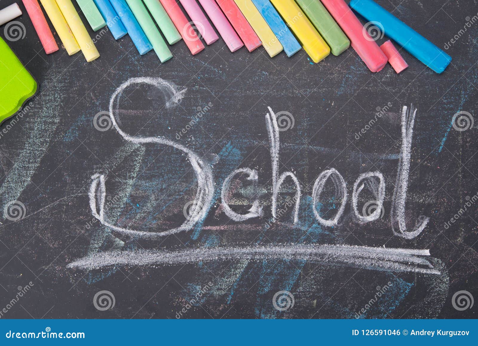 On the Background of a Black Board, the Word School is Written ...
