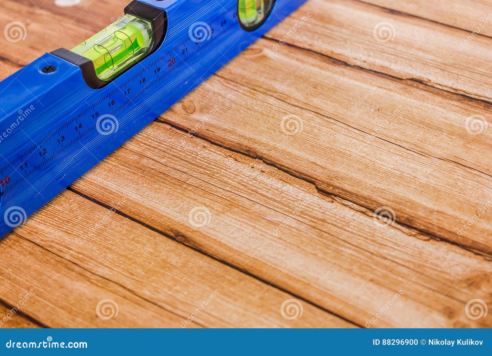 Background Blue Building Level on Wooden Background Stock Photo - Image ...