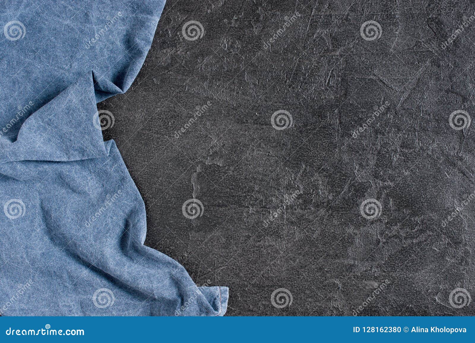 Background with Blue Denim Napkin on the Dark Gray Textured Table Stock ...