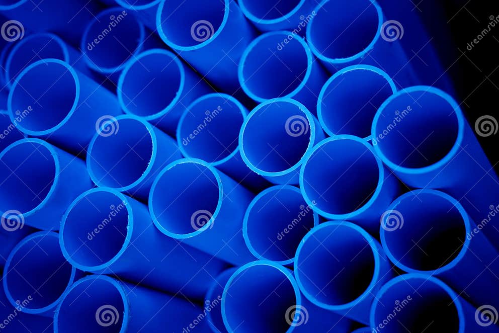 Background of the Blue Plastic Pipes in Stacked Stock Photo - Image of ...