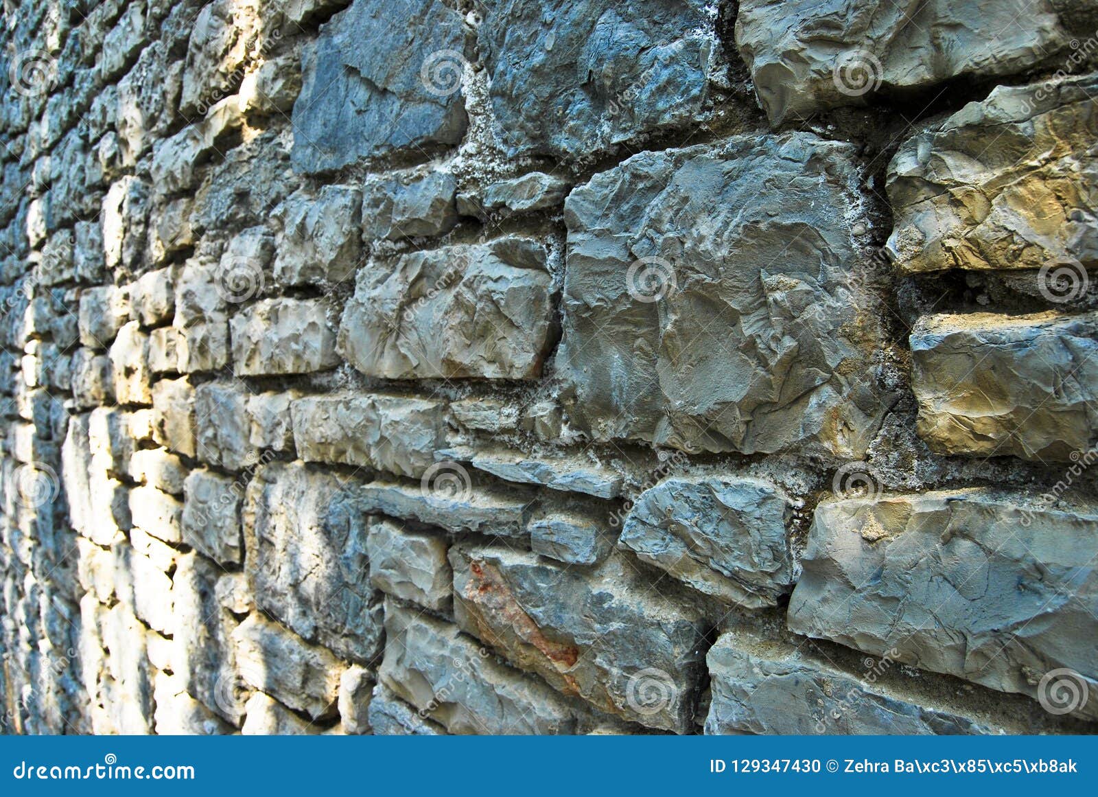 Shaded blue wall stone stock photo. Image of background - 129347430