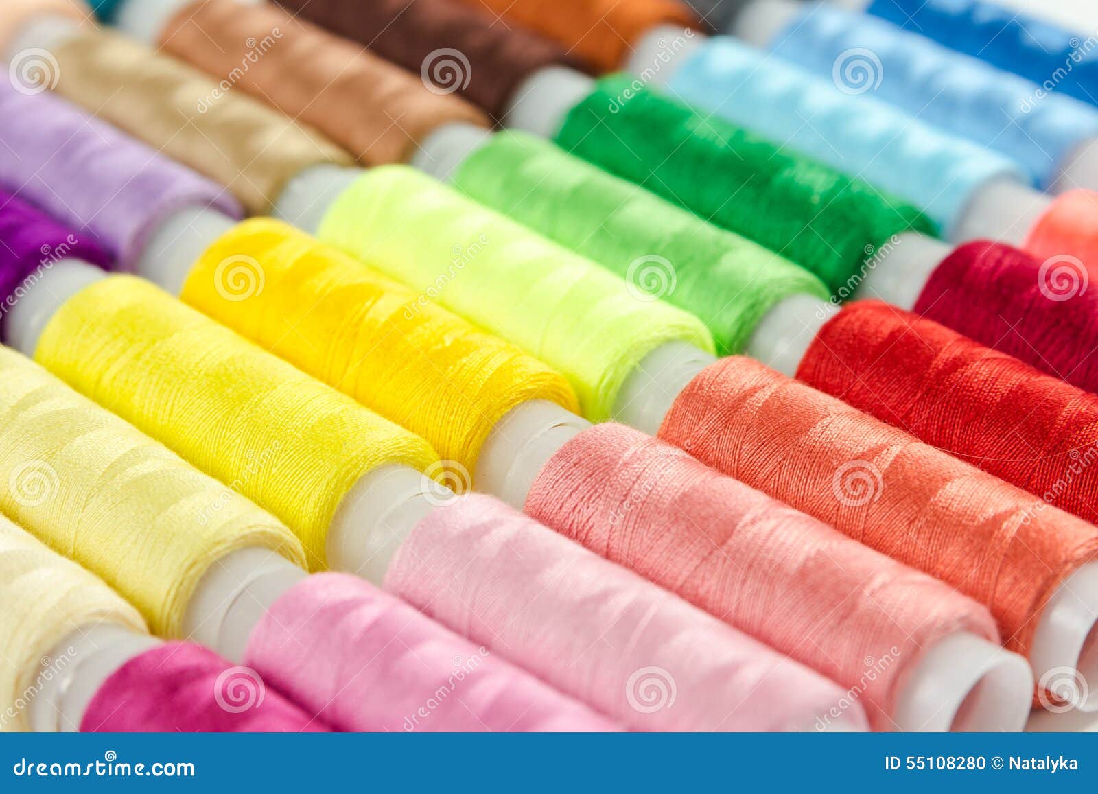Background from Bobbins with Multicolored Thread Stock Photo - Image of ...