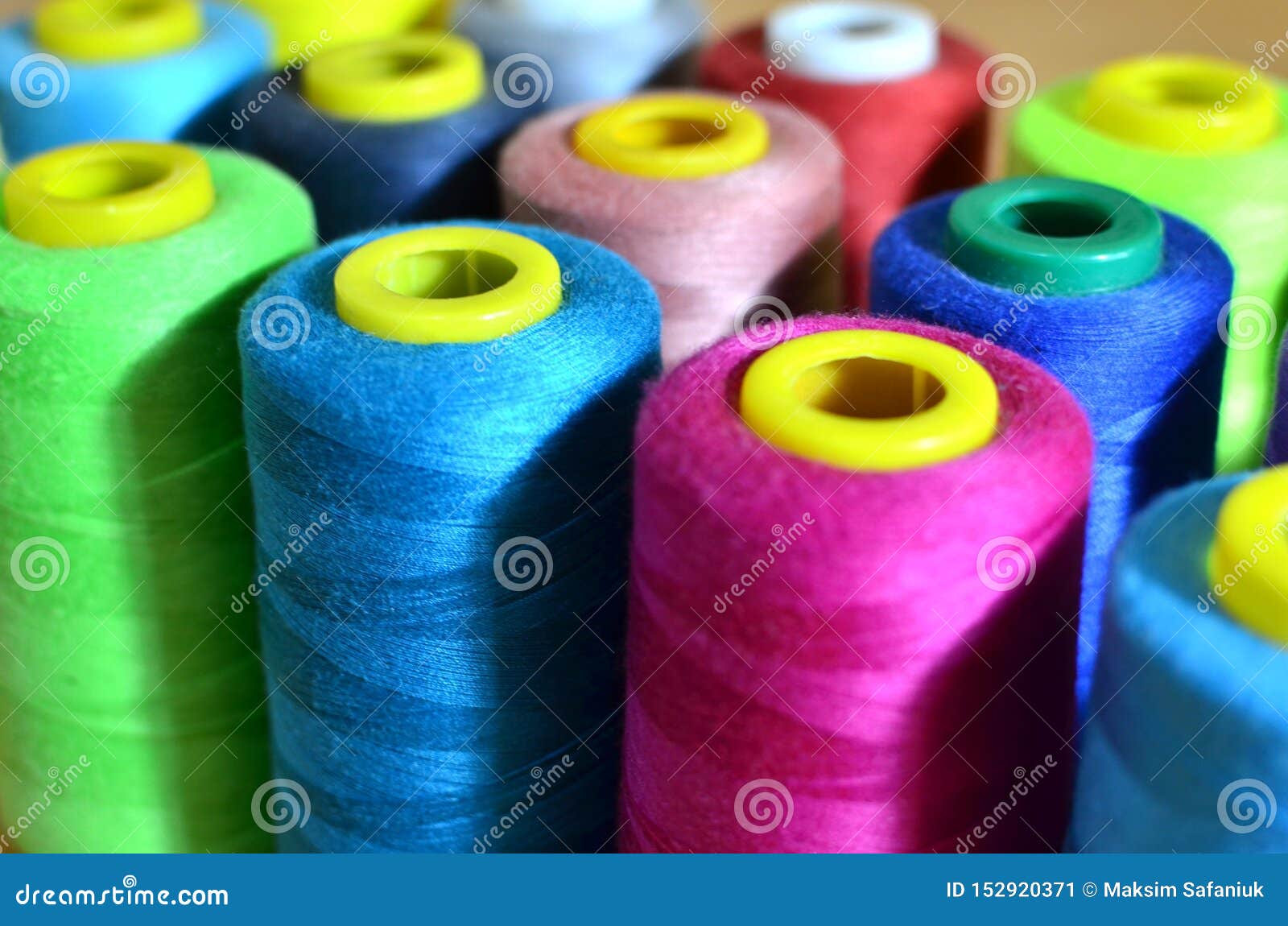 Background of Bobbins with Multicolored Threads for Sewing. Needlework ...