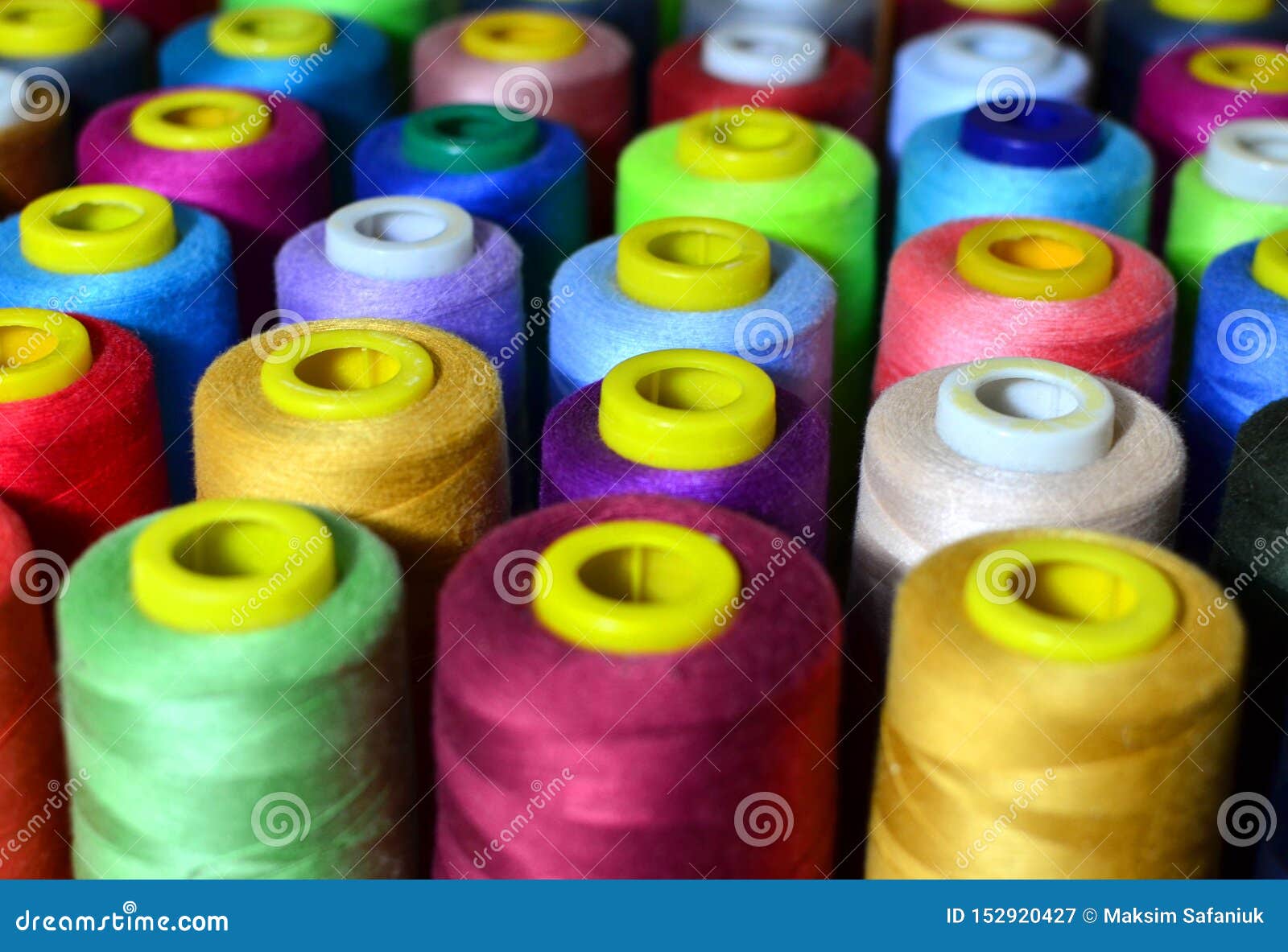 Background of Bobbins with Multicolored Threads for Sewing. Needlework ...