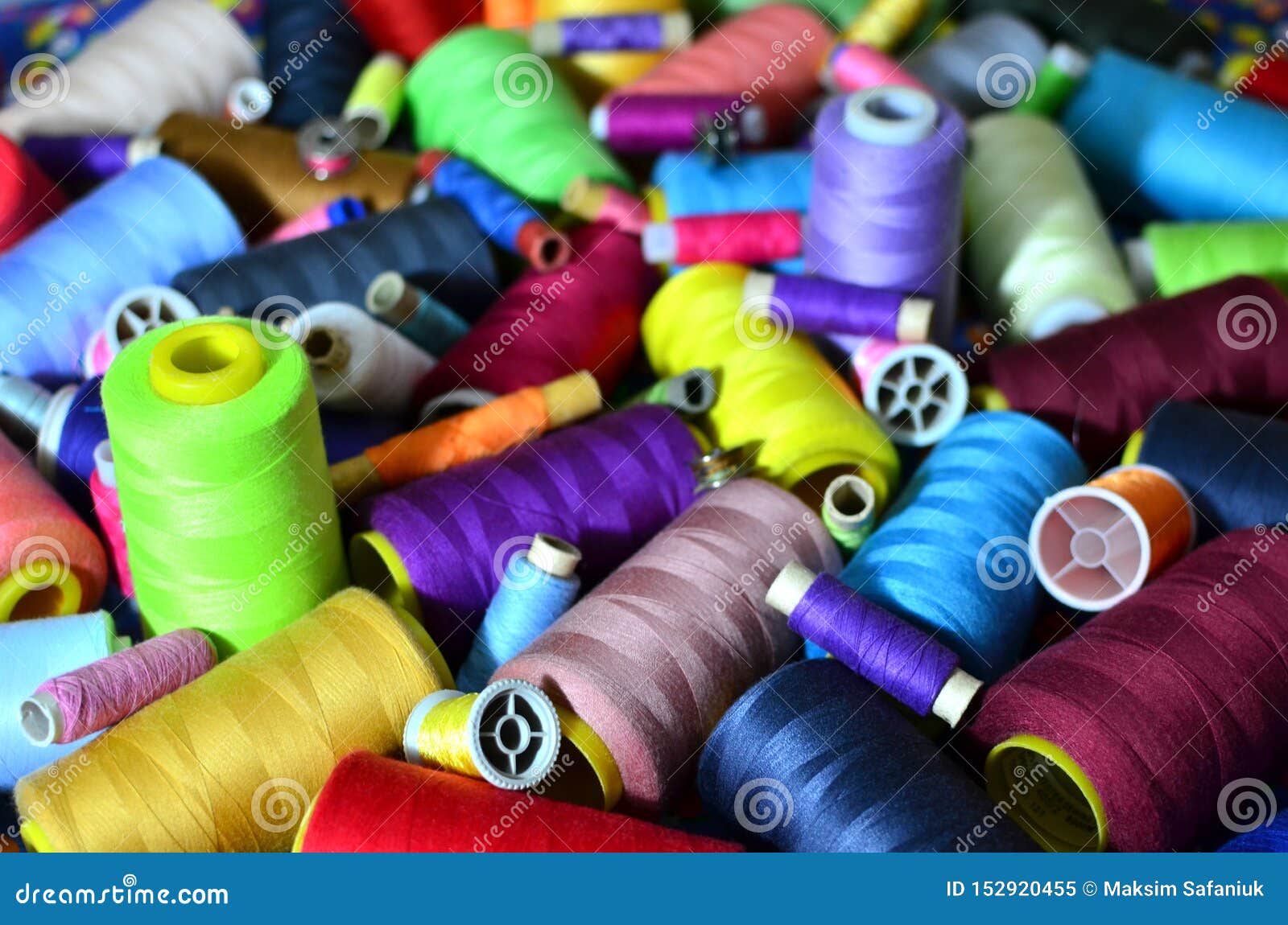 Background of Bobbins with Multicolored Threads for Sewing. Needlework ...