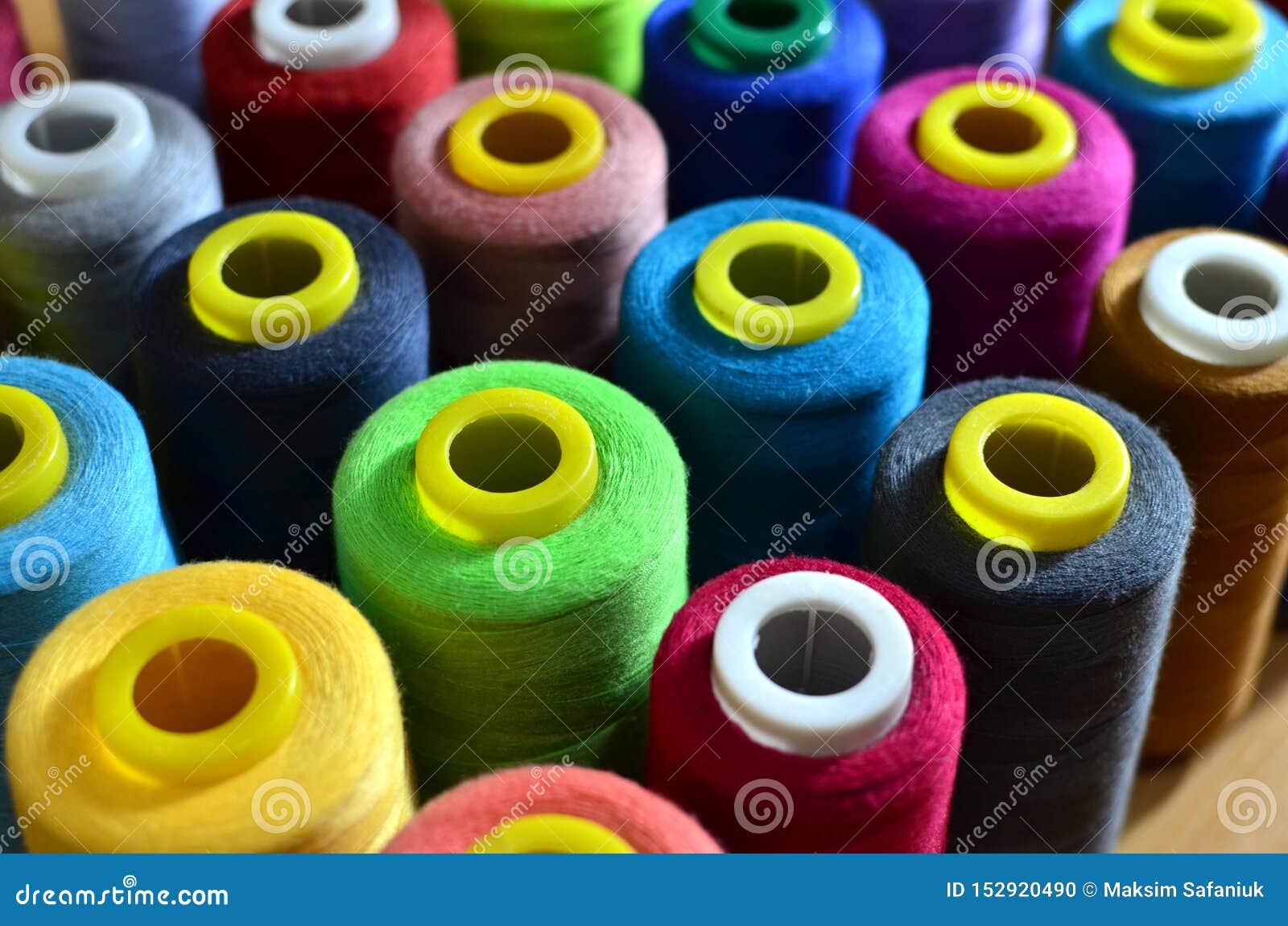 Background of Bobbins with Multicolored Threads for Sewing. Needlework ...