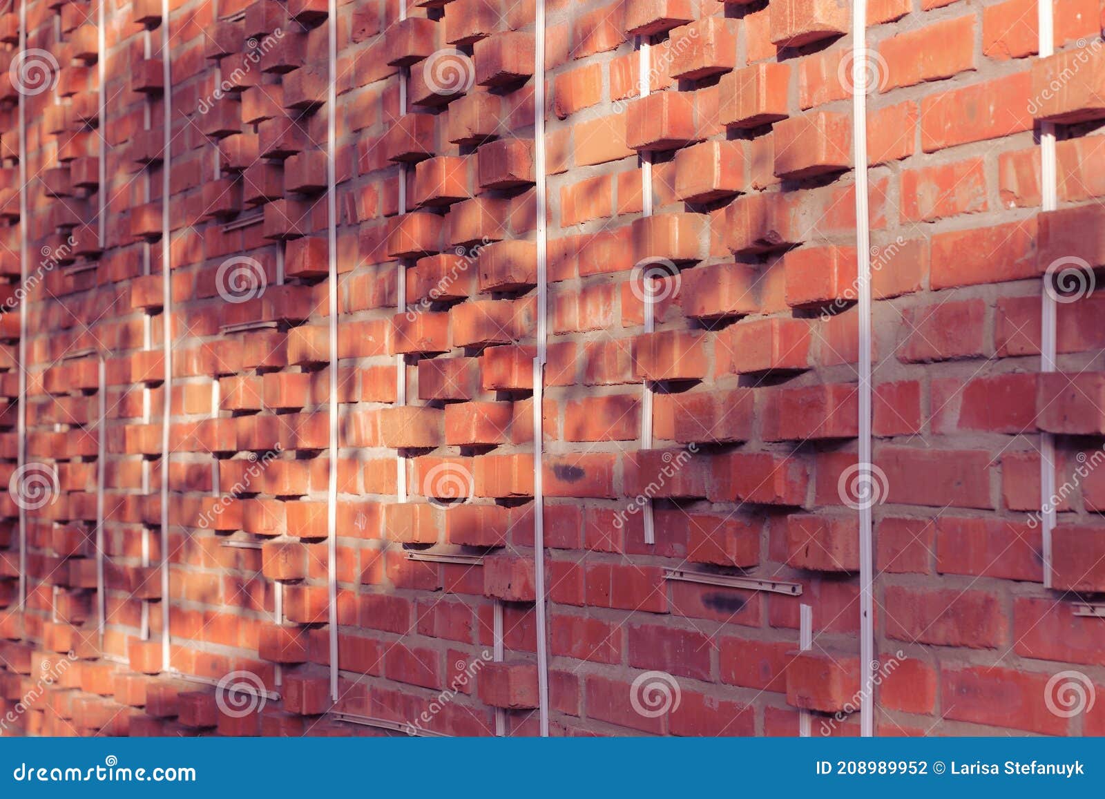 Red brick wall in the sun stock photo. Image of city - 208989952