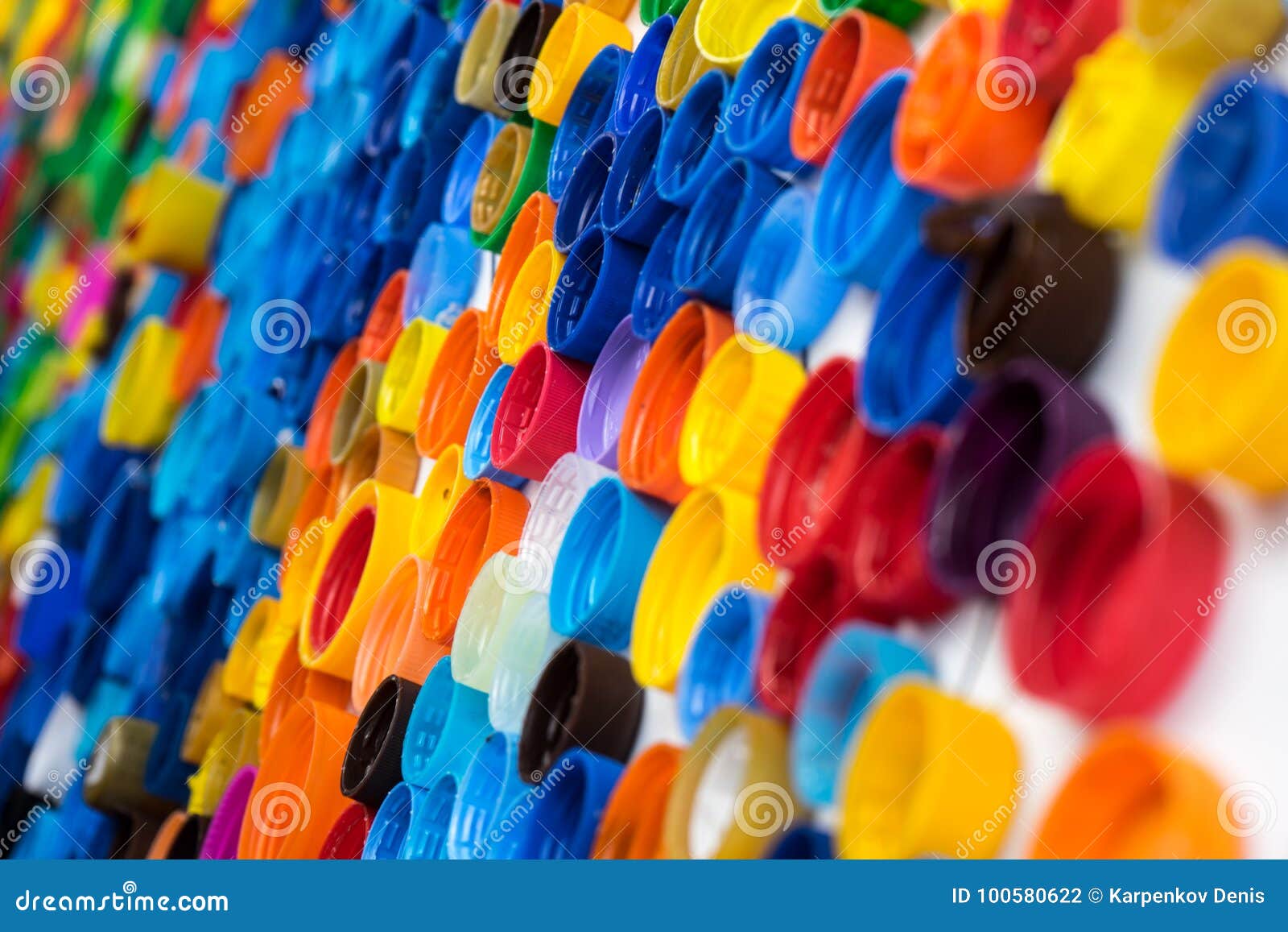 Background of Bright Colored Plastic Plugs Stock Photo - Image of ...