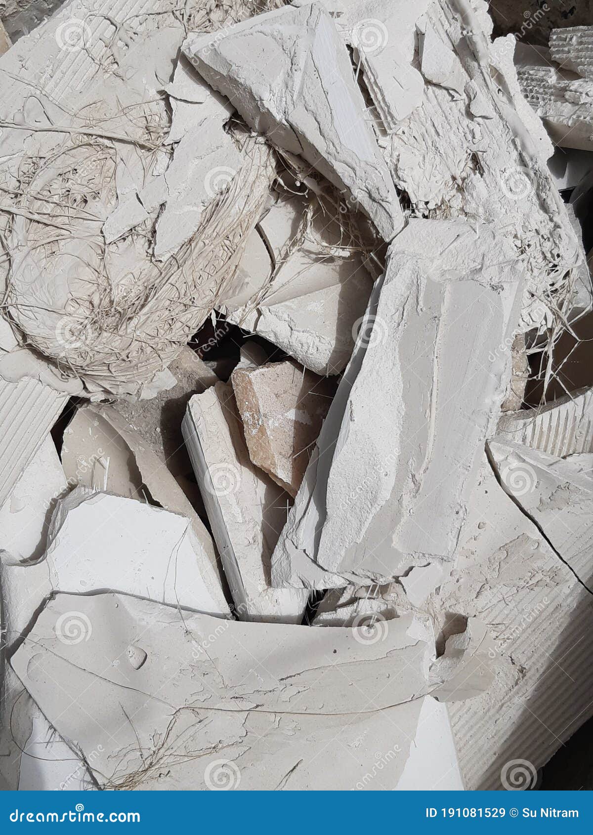 Background of Broken White Plaster Pieces of Different Shapes and ...