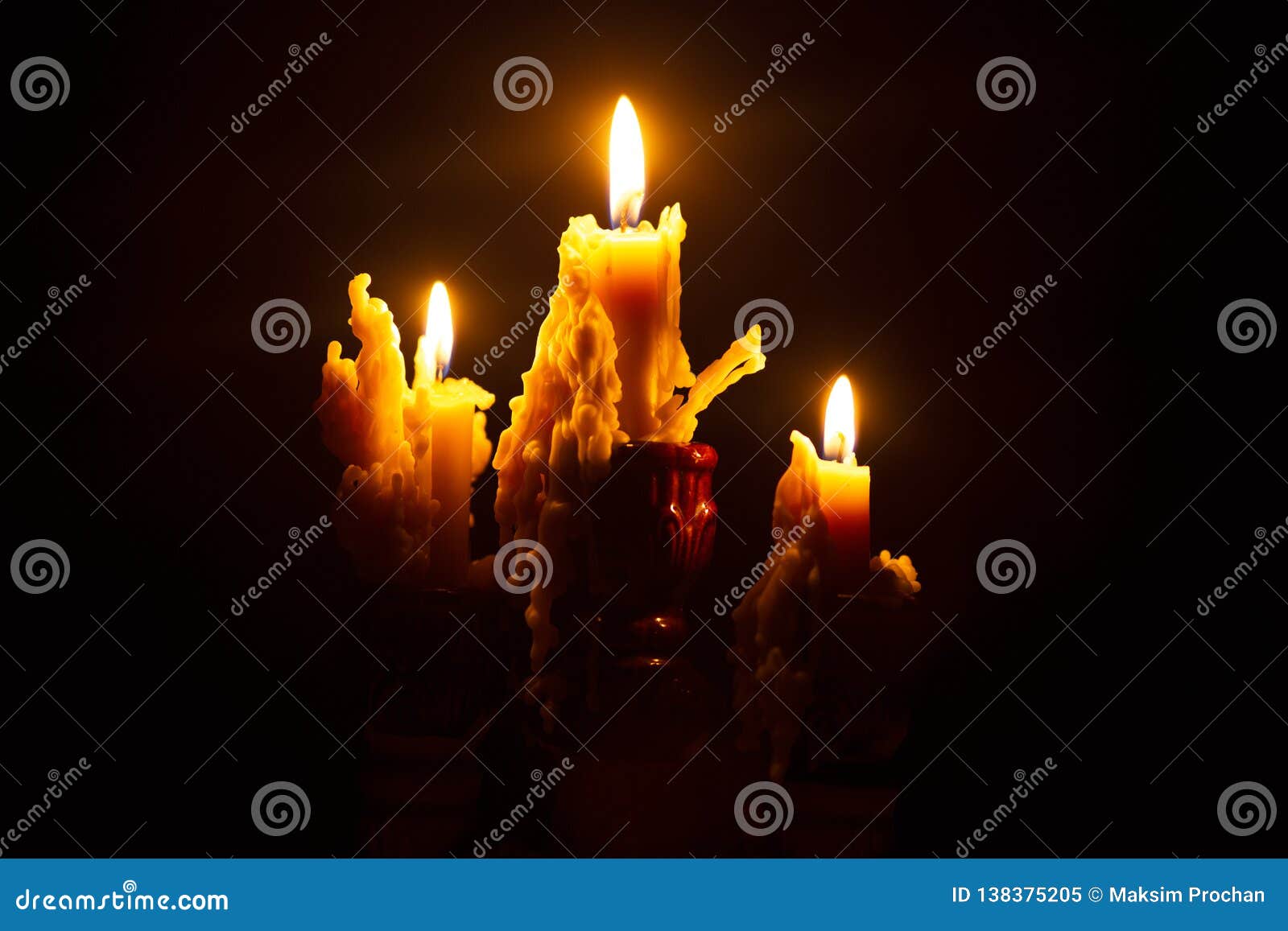 Background of Burning Candles in a Candlestick, the Wax Melts from the ...