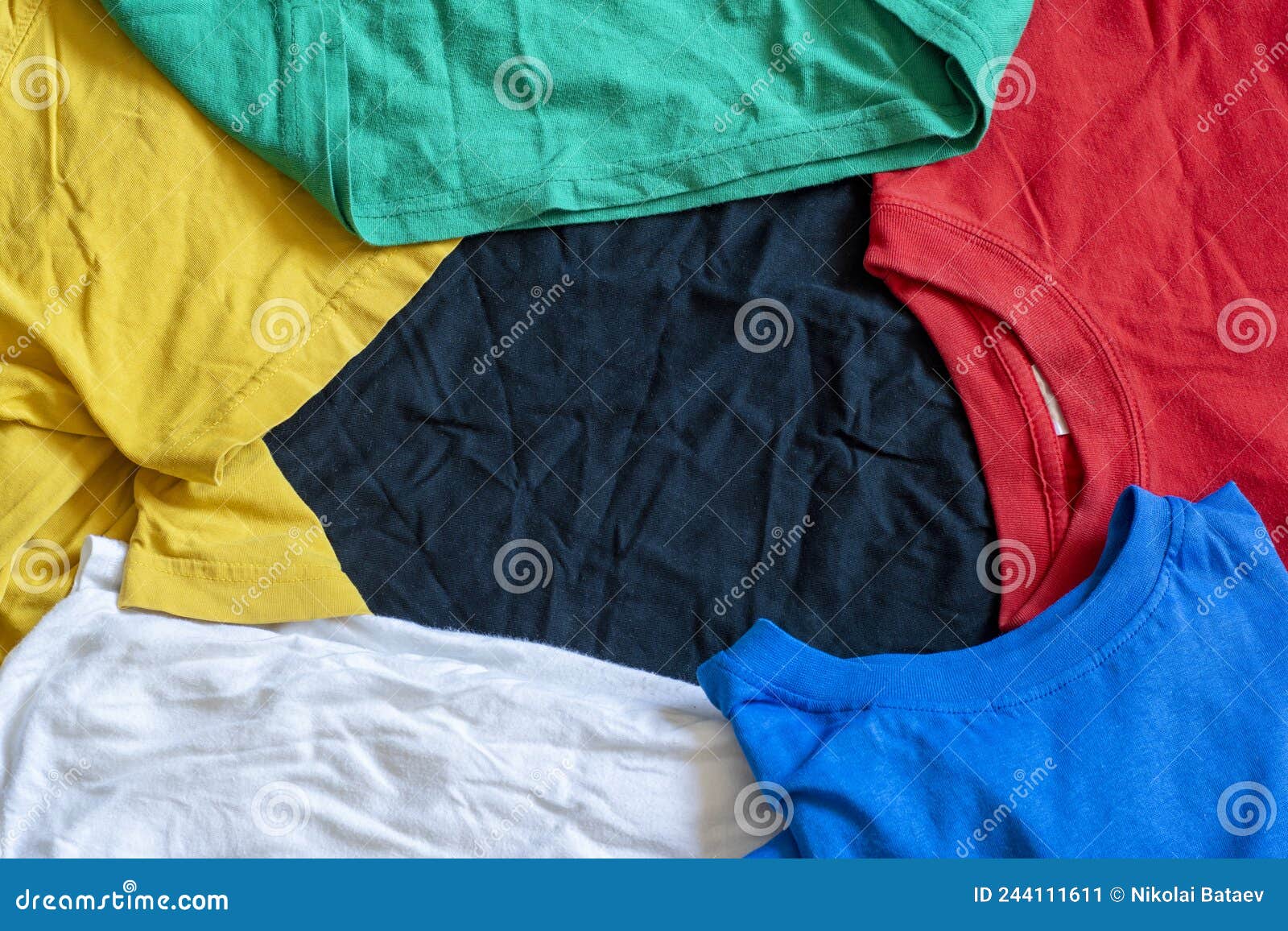 Background and Casually Lying Multi-colored T-shirts Stock Image ...