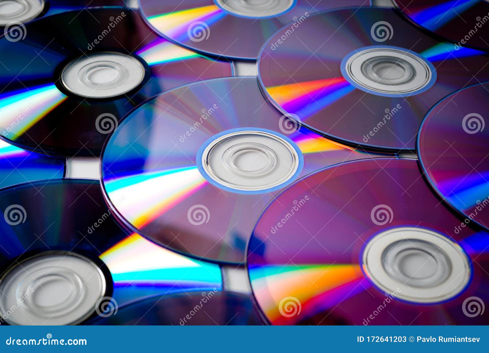 Background CD and DVD Discs Laid Out on a Flat Surface. Background for ...