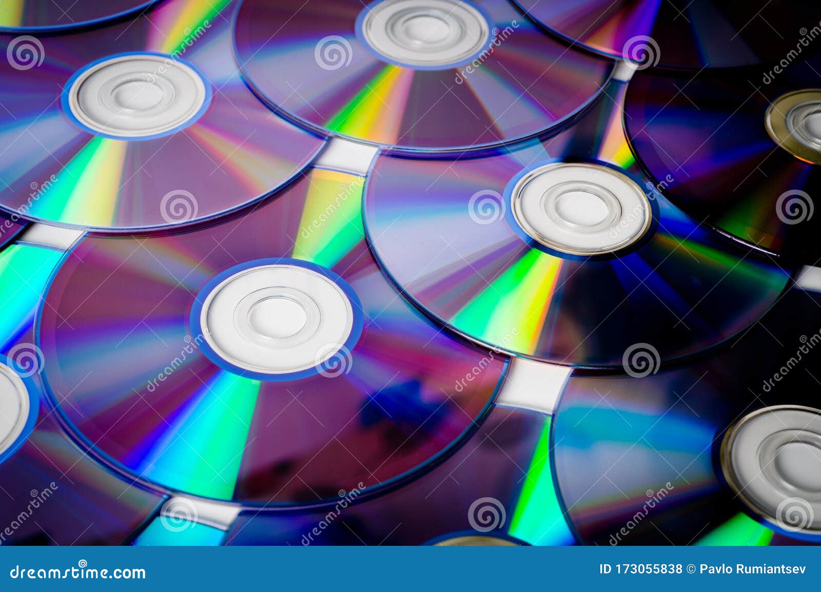 Background CD and DVD Discs Laid Out on a Flat Surface. Background for ...