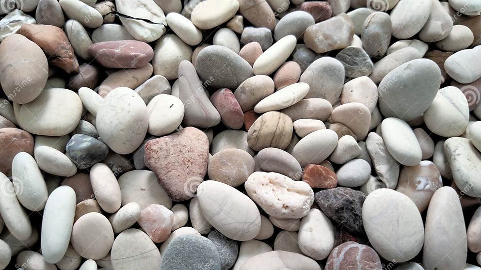 Background of a Collection of Pebbles Arranged in Texture Stock Image ...