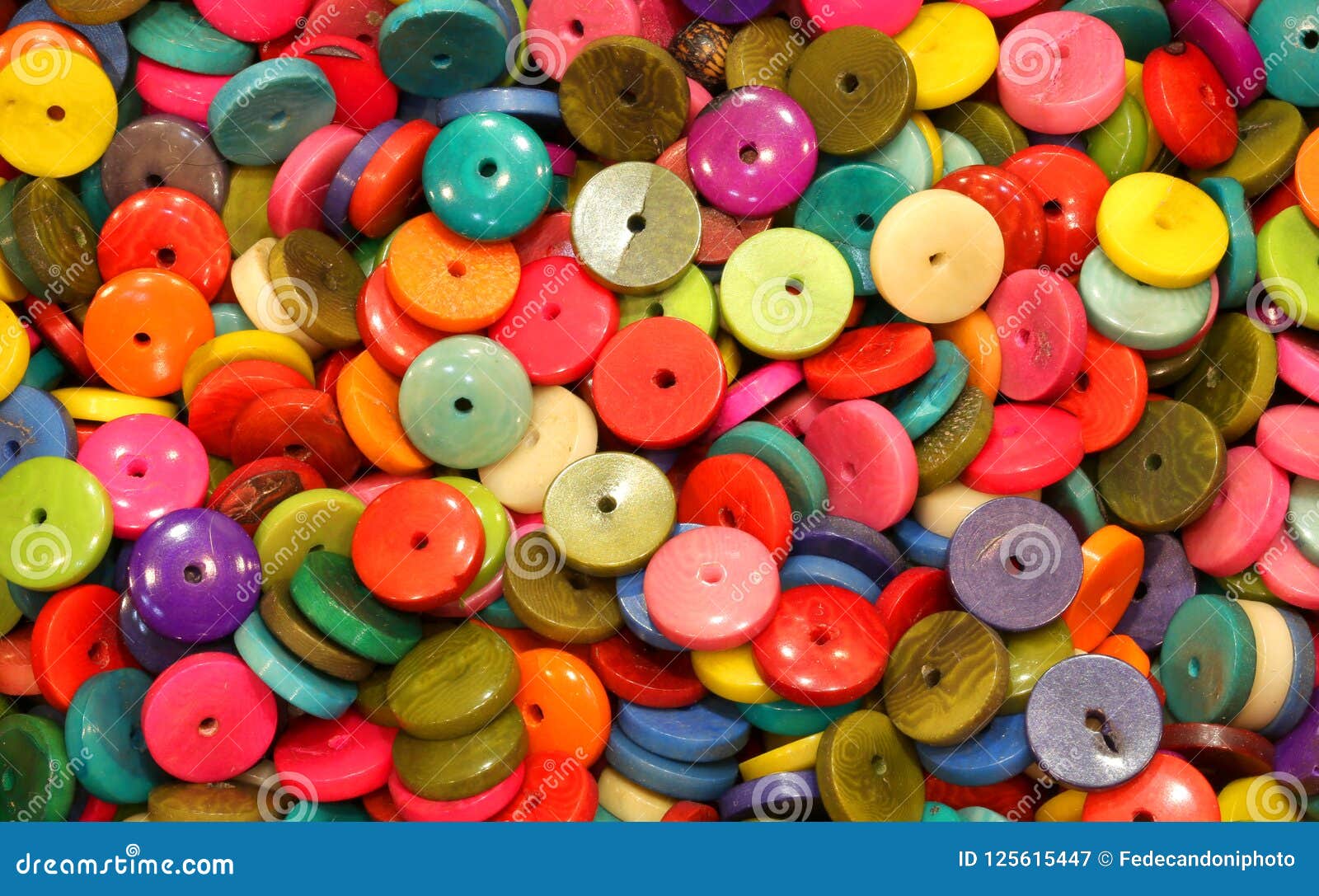 Background of Colored Ivory Buttons Stock Image - Image of clothing ...