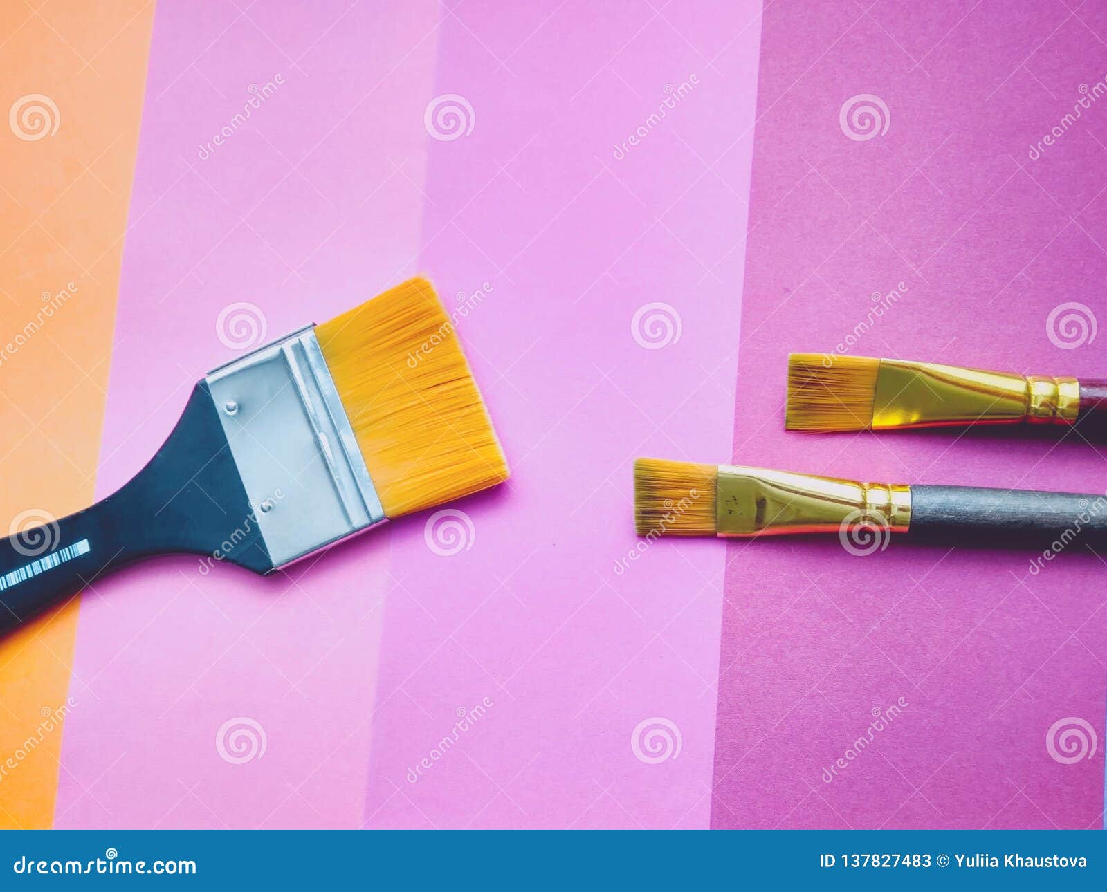 Paint Brushes on a Background of Colored Paper Stock Image - Image of ...