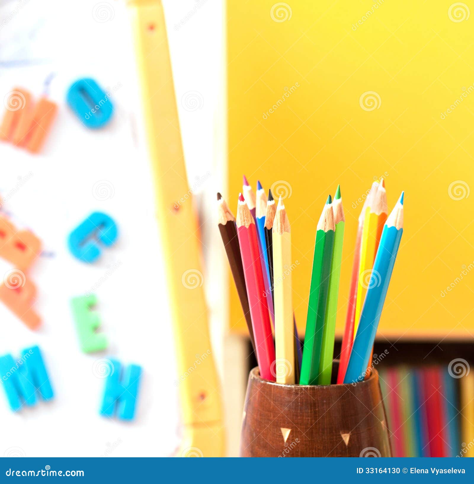 Background with Colored Pencils and Letters Stock Photo - Image of book ...