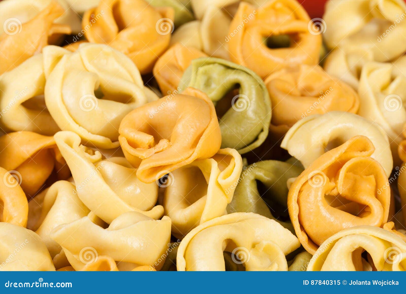 Background of Colored Tortellini, Ring-shaped Pasta Stock Image - Image ...
