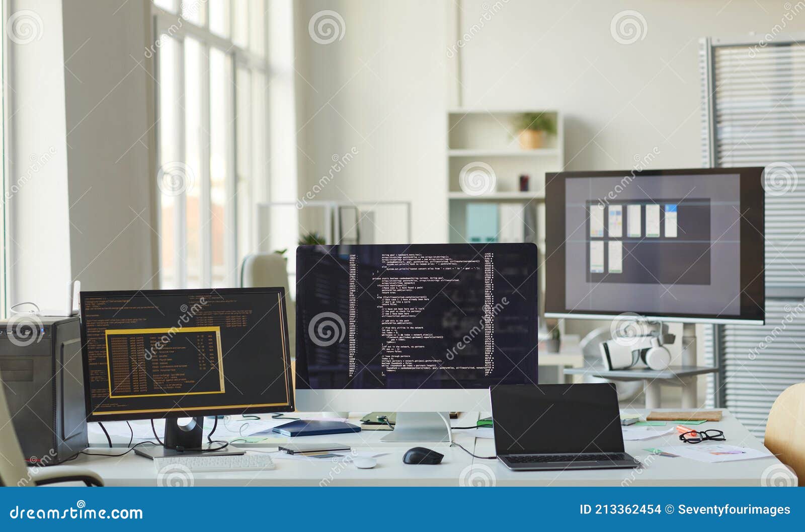 Background of Computers with Code on Screen in it Office Stock Photo ...