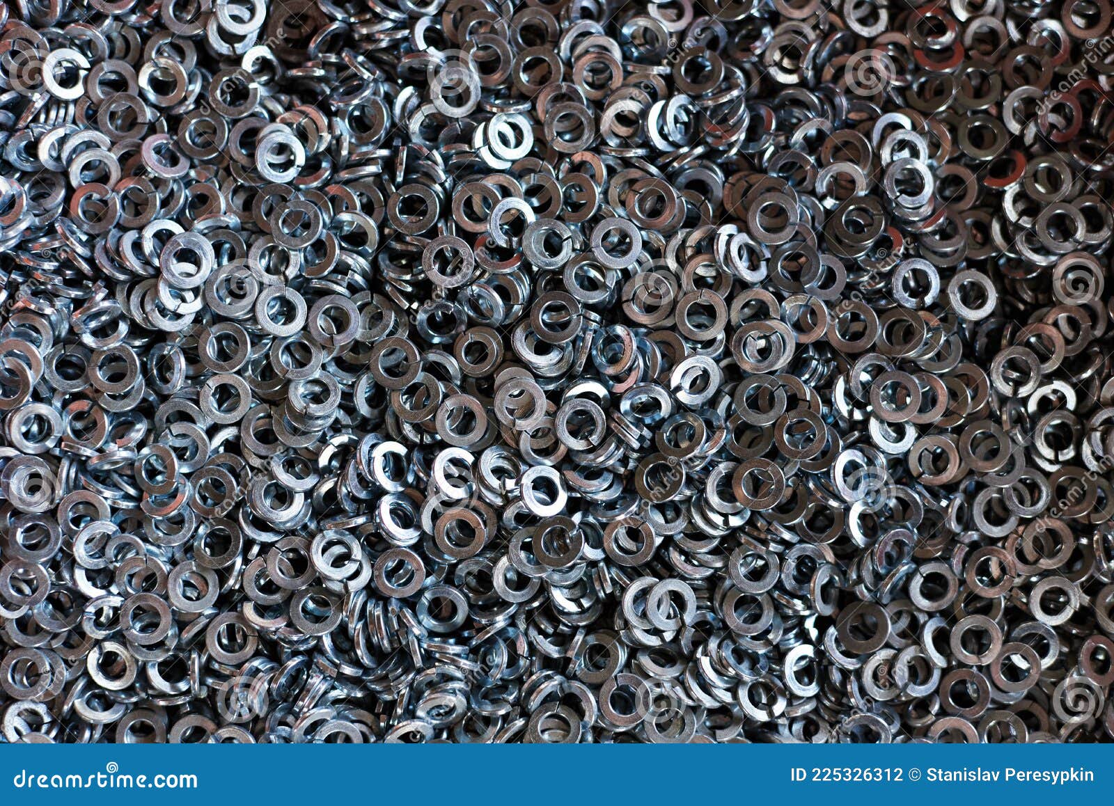 The Background Consists of a Large Number of Locking Washers Stock ...