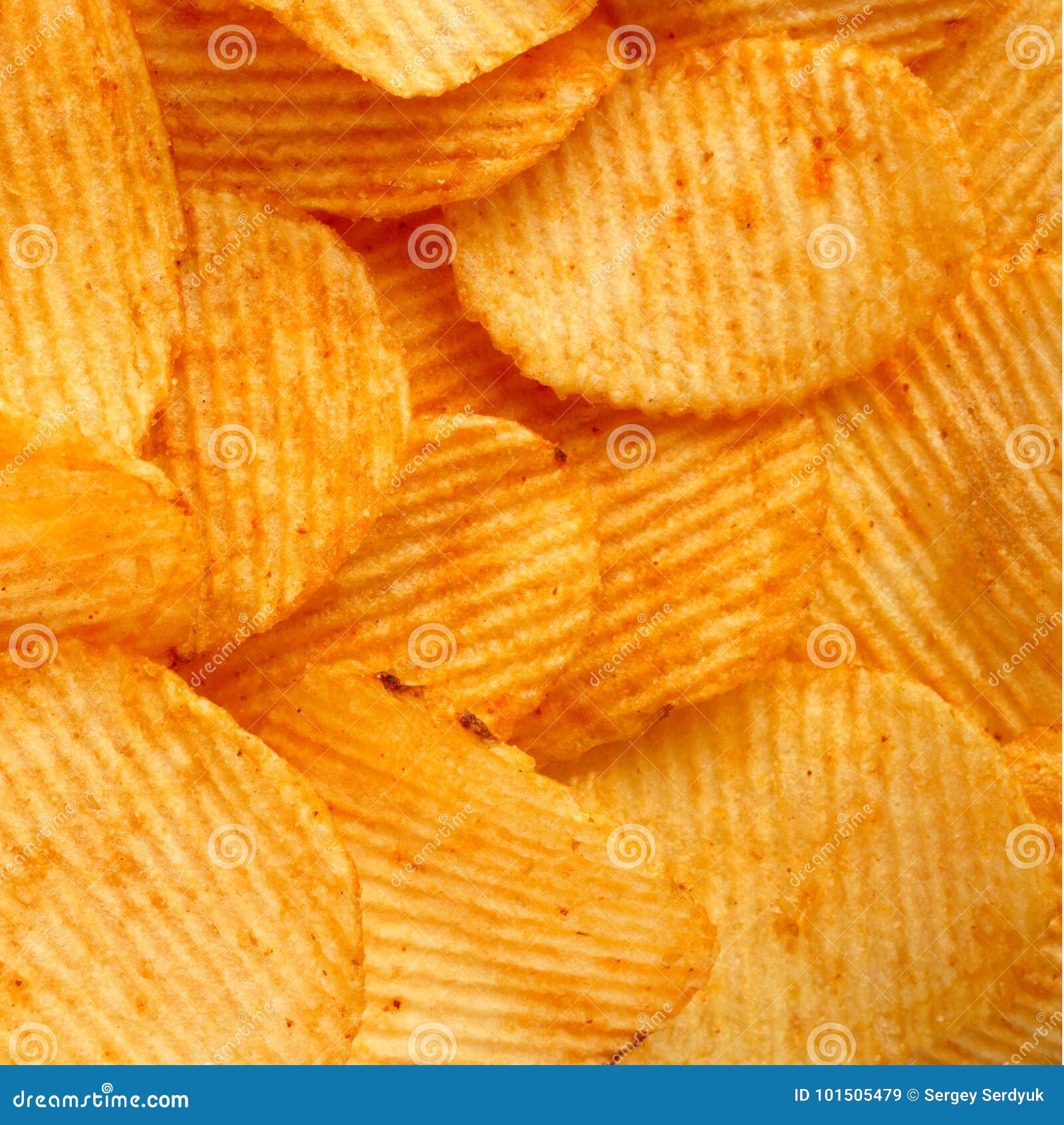 Background of Crispy Golden Chips with Ribbed Texture, Seasoned, with ...