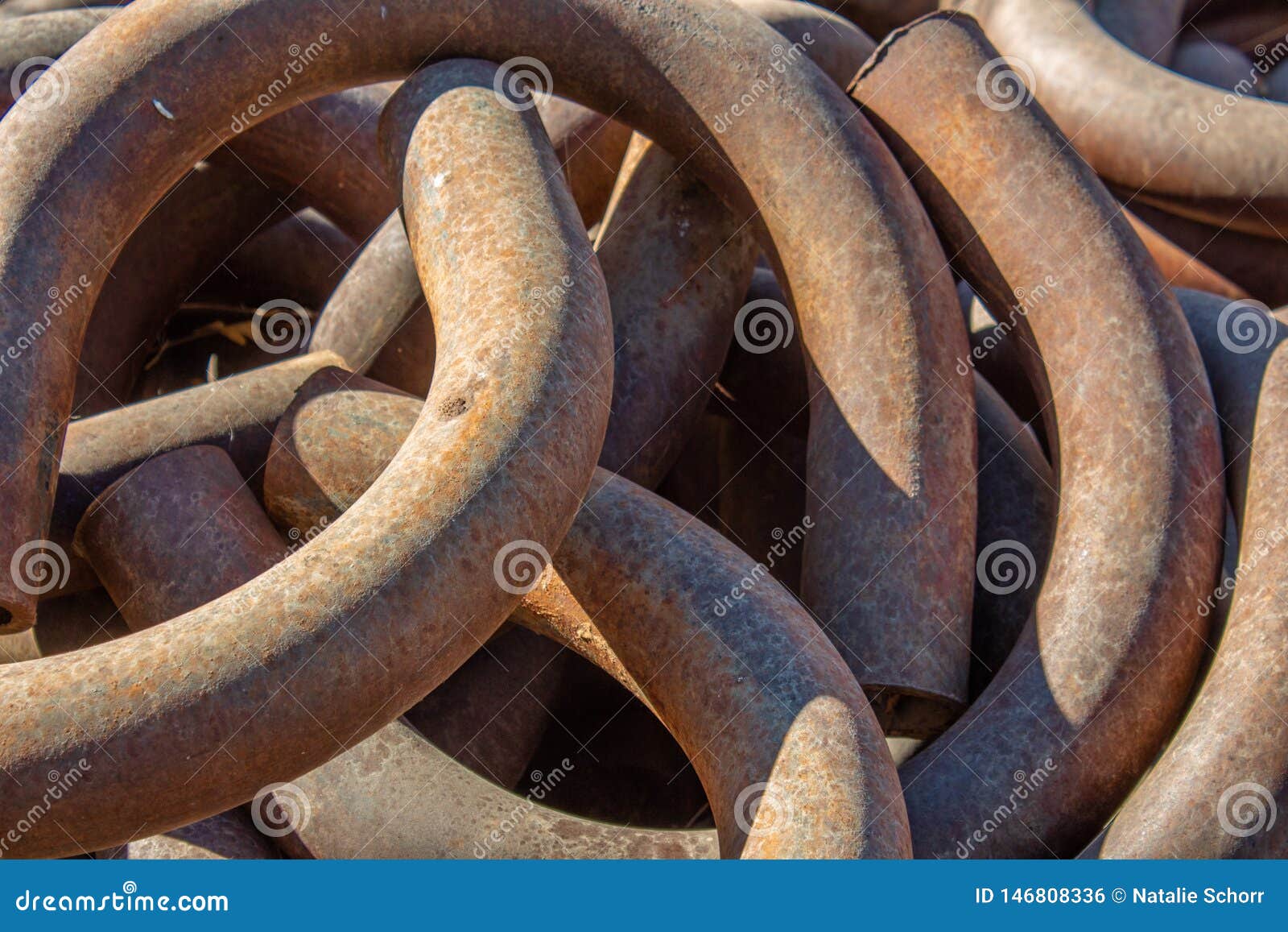 Background of Curved, Rusty Metal Pipes Stock Photo - Image of ...