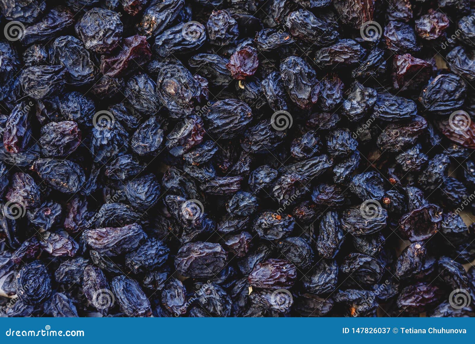 Background from Dark Blue Raisins. Close-up Stock Image - Image of ...