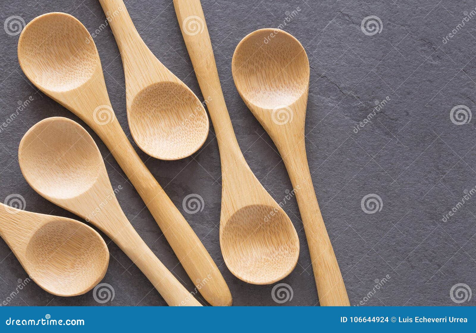 Wooden Spoons on the Rustic Stone Background Stock Photo - Image of ...