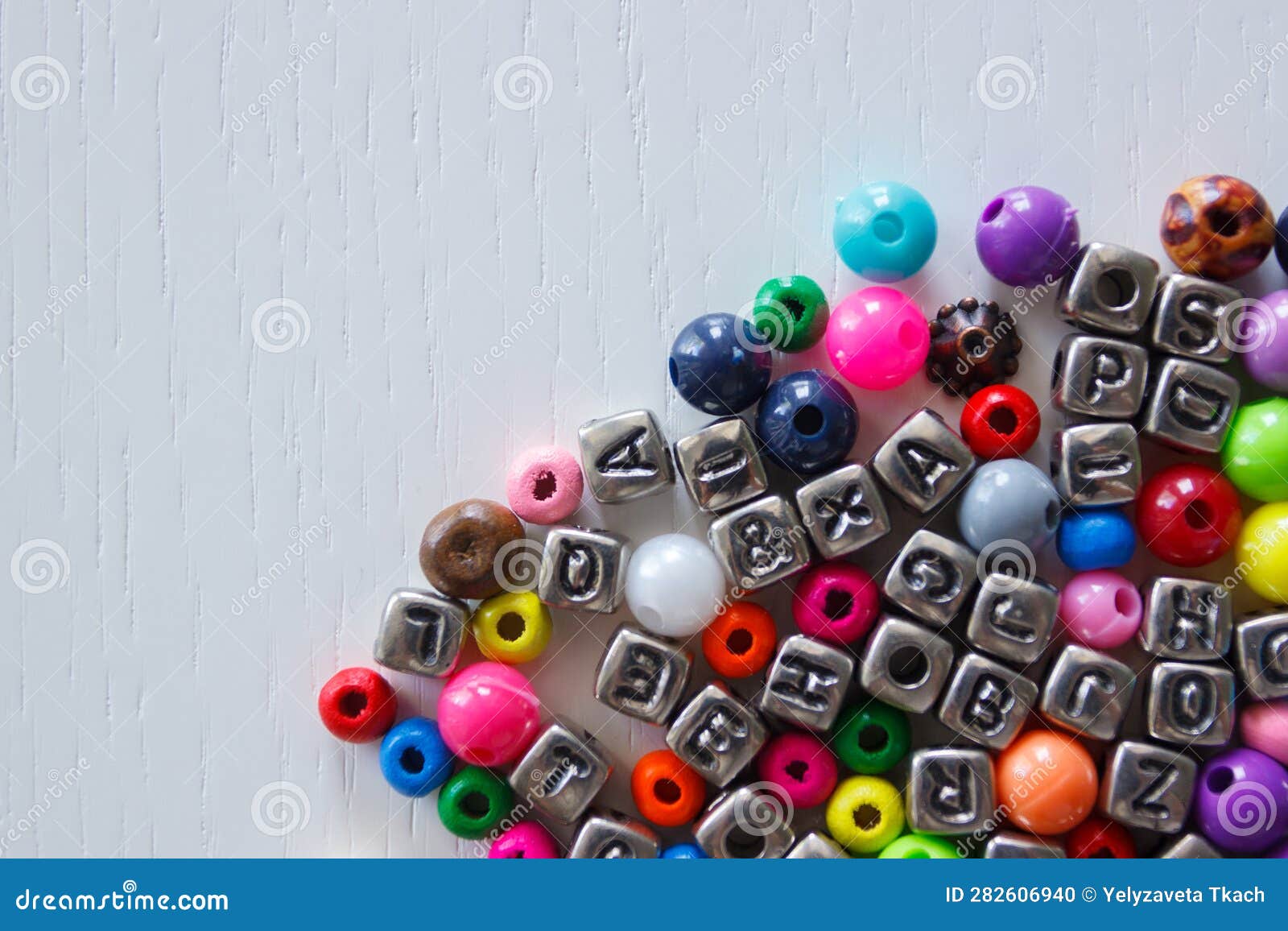 Background from Different Colored Beads with Numbers and Symbols Stock ...