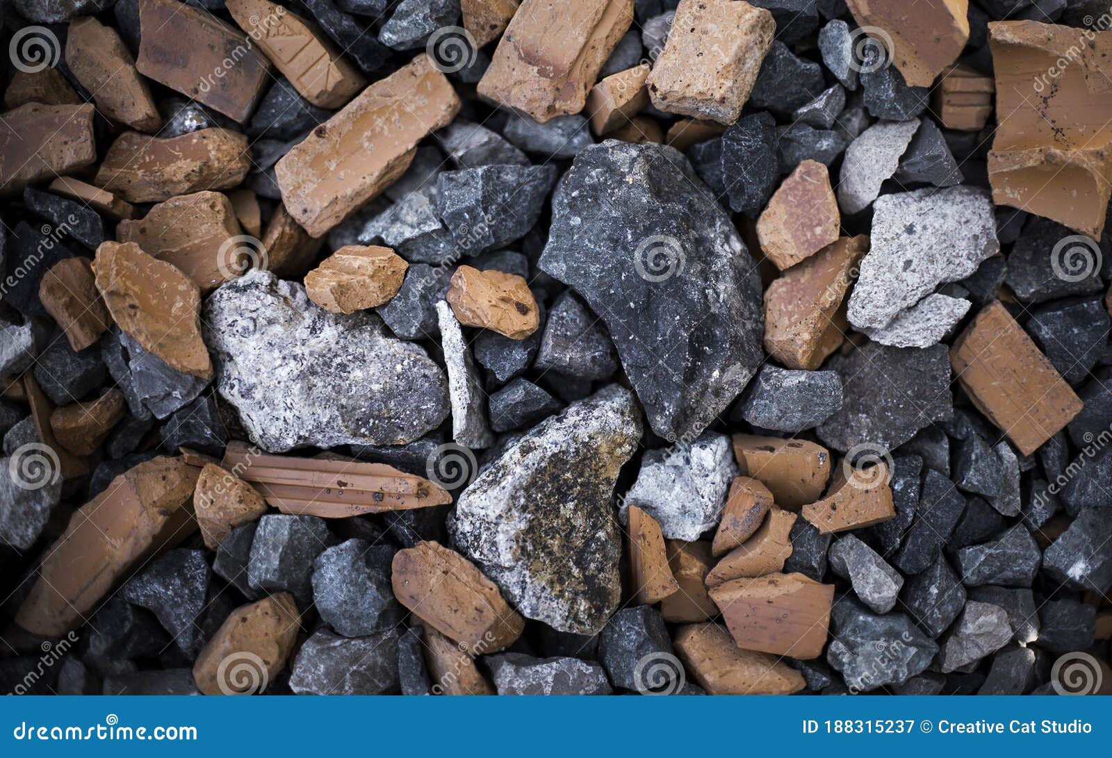 Background with Different Size and Colour Rocks and Bricks on the ...