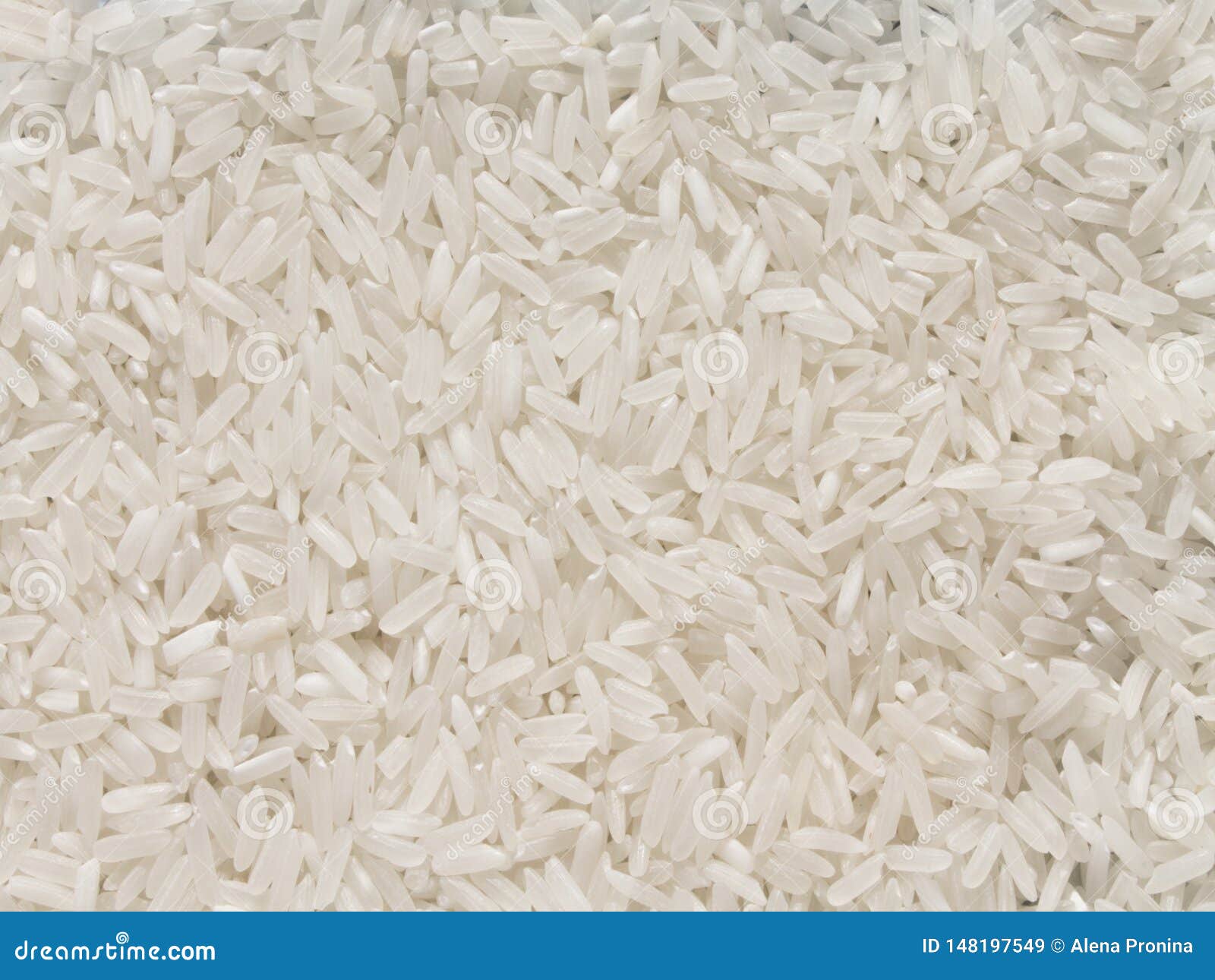 The Background is of a Dry Cleaned White Raw Milled Rice Scattered on ...