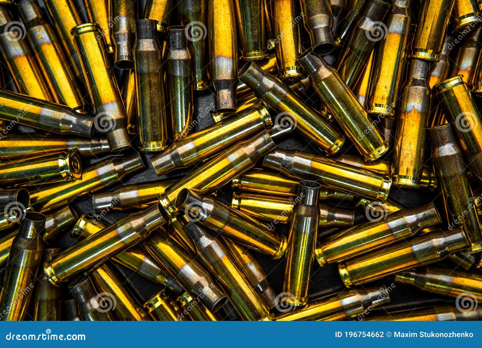 Background from Empty Cartridges for Rifles and Carbines. Shiny Brass ...