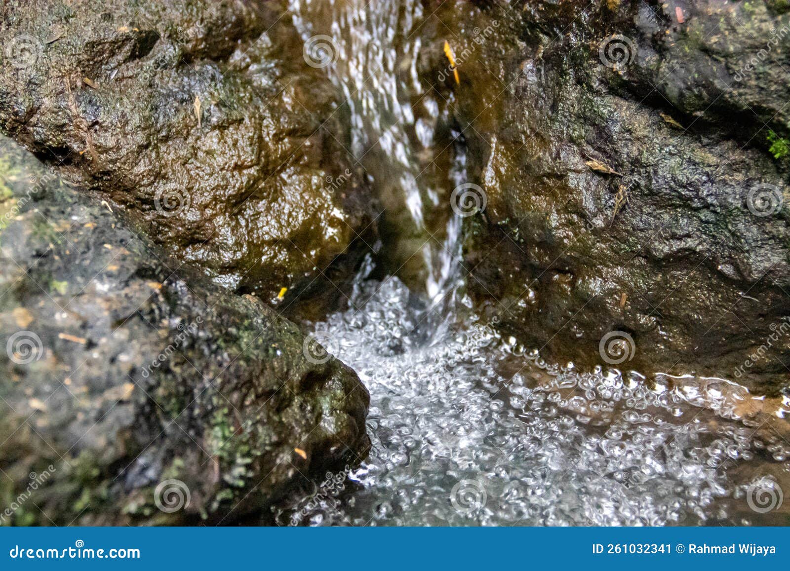 Background Flowing Water Falling between the Rocks in the River Stock ...