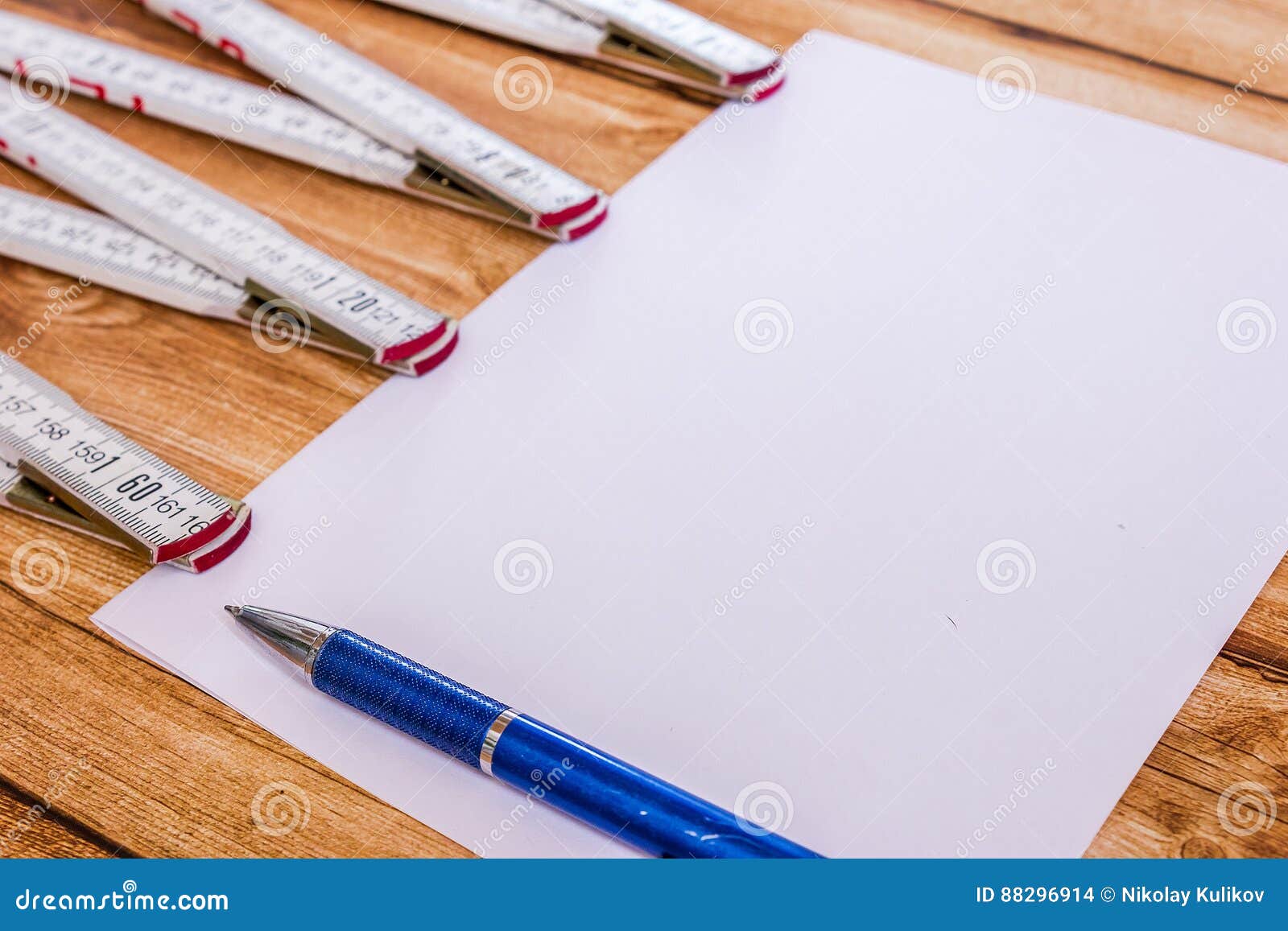 Background Foldable Ruler and a Sheet of Paper Stock Photo - Image of ...