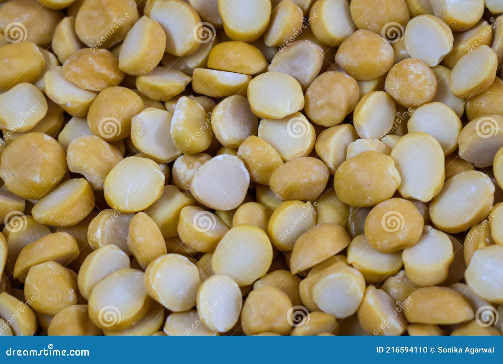 A Background Full of Yellow Split Chickpeas Stock Photo - Image of ...
