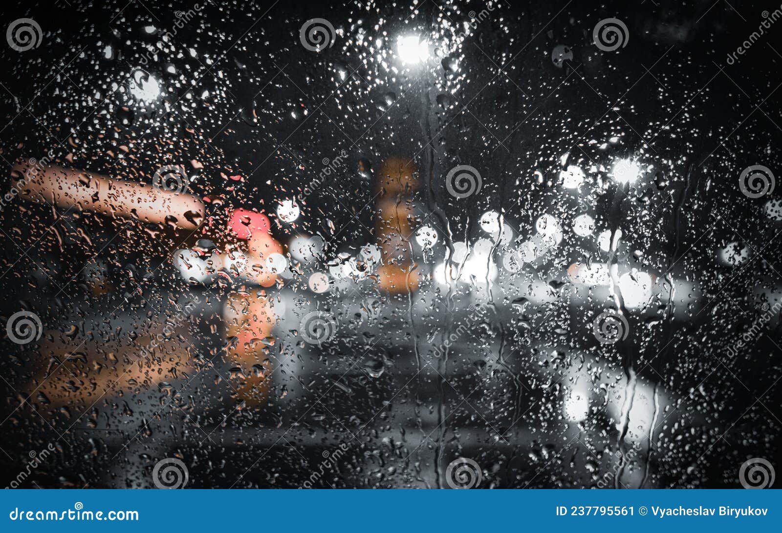 Background of Glowing Lights through Raindrops Stock Image - Image of ...