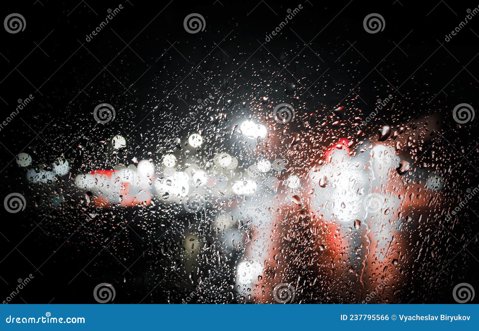 Background of Glowing Lights through Raindrops Stock Photo - Image of ...
