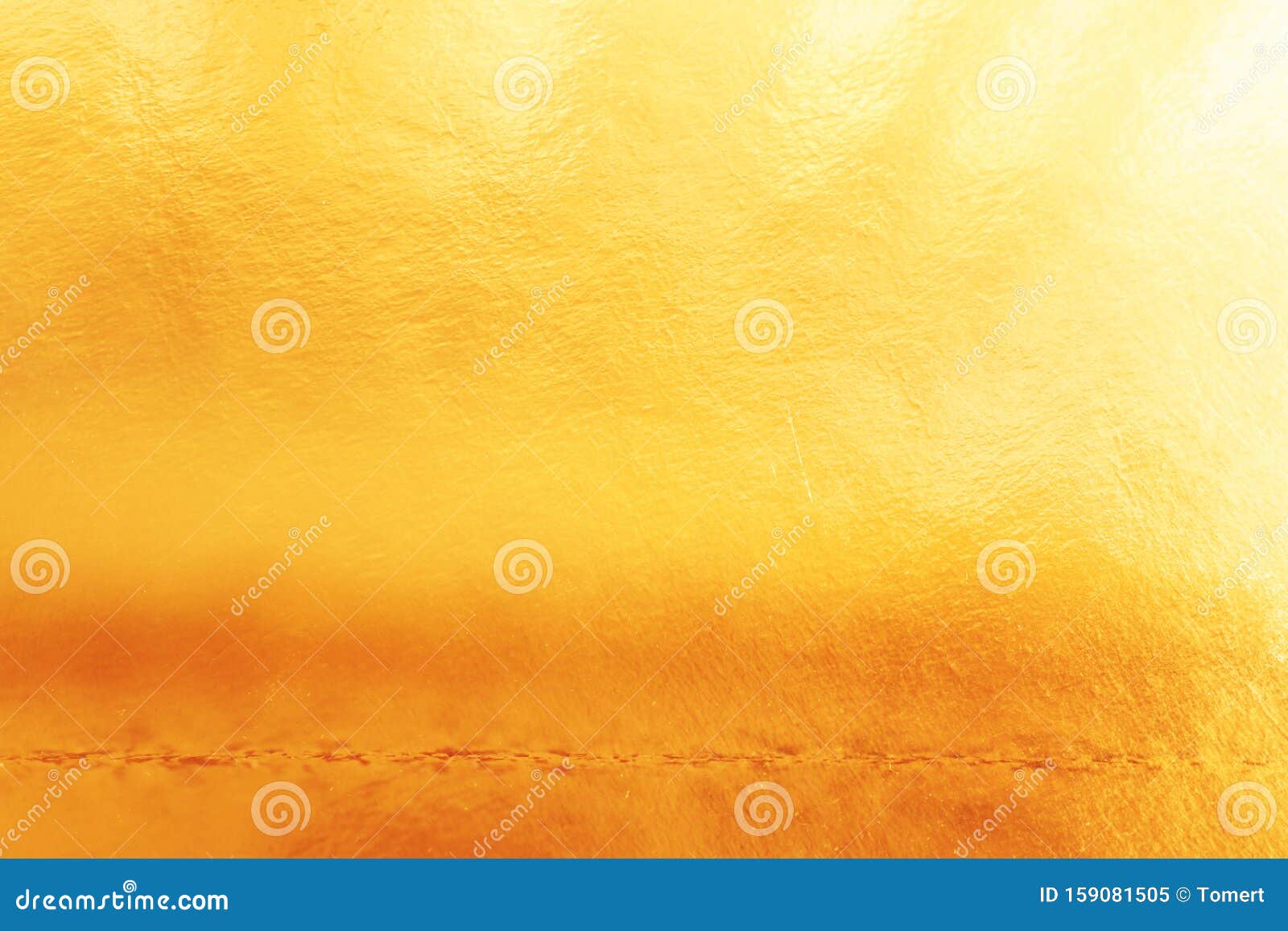Background Of Gold Foil Texture With Light Reflections Stock Image ...